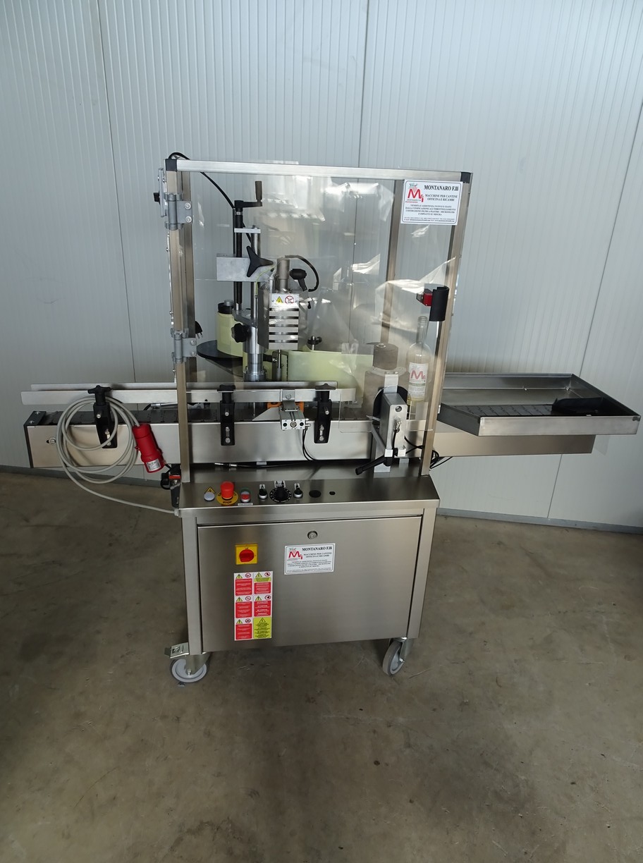 AUTOMATIC ADHESIVE LABELLING MACHINE